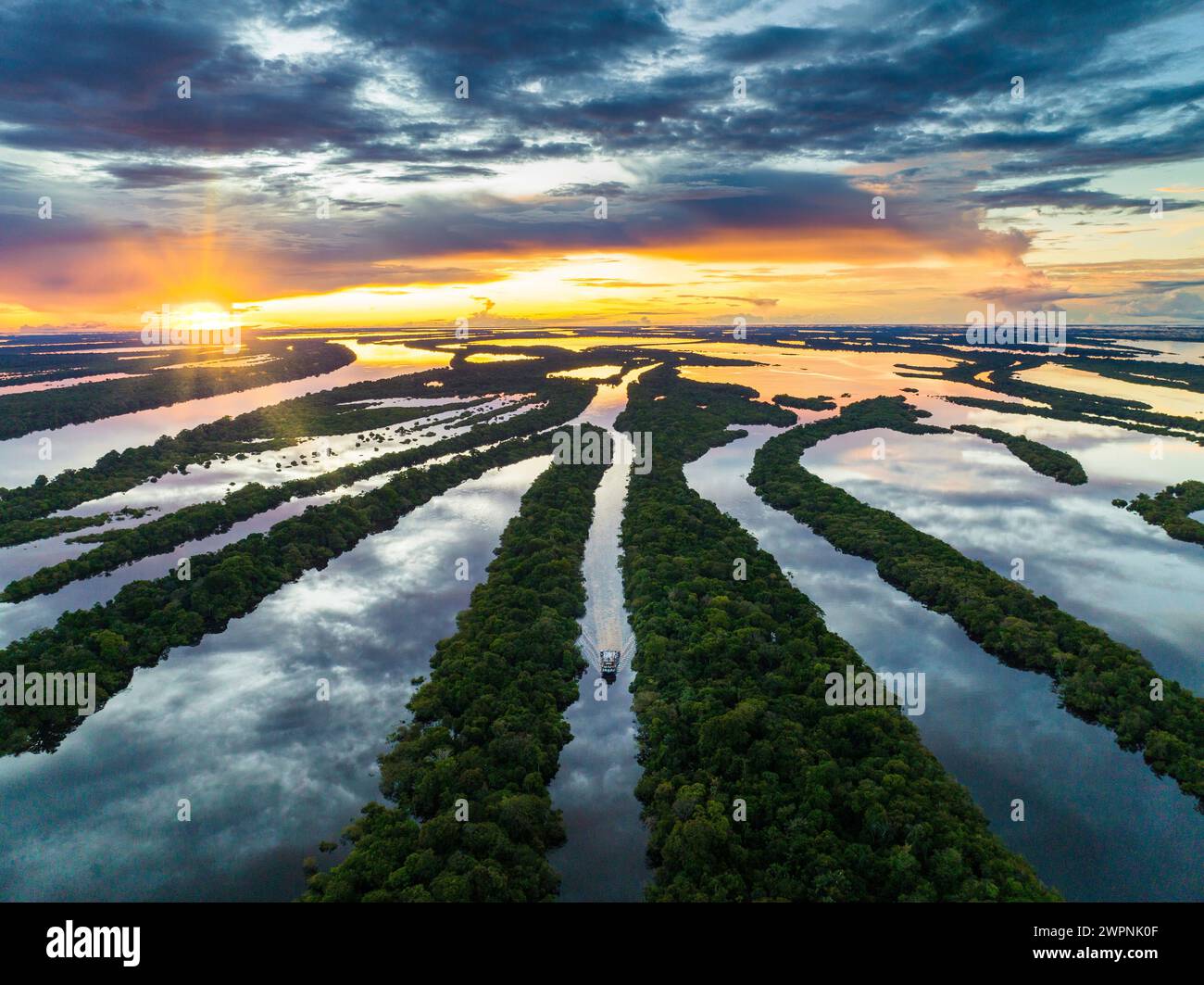 Amazon in the Brazilian rainforest with small boutique ship Stock Photo ...