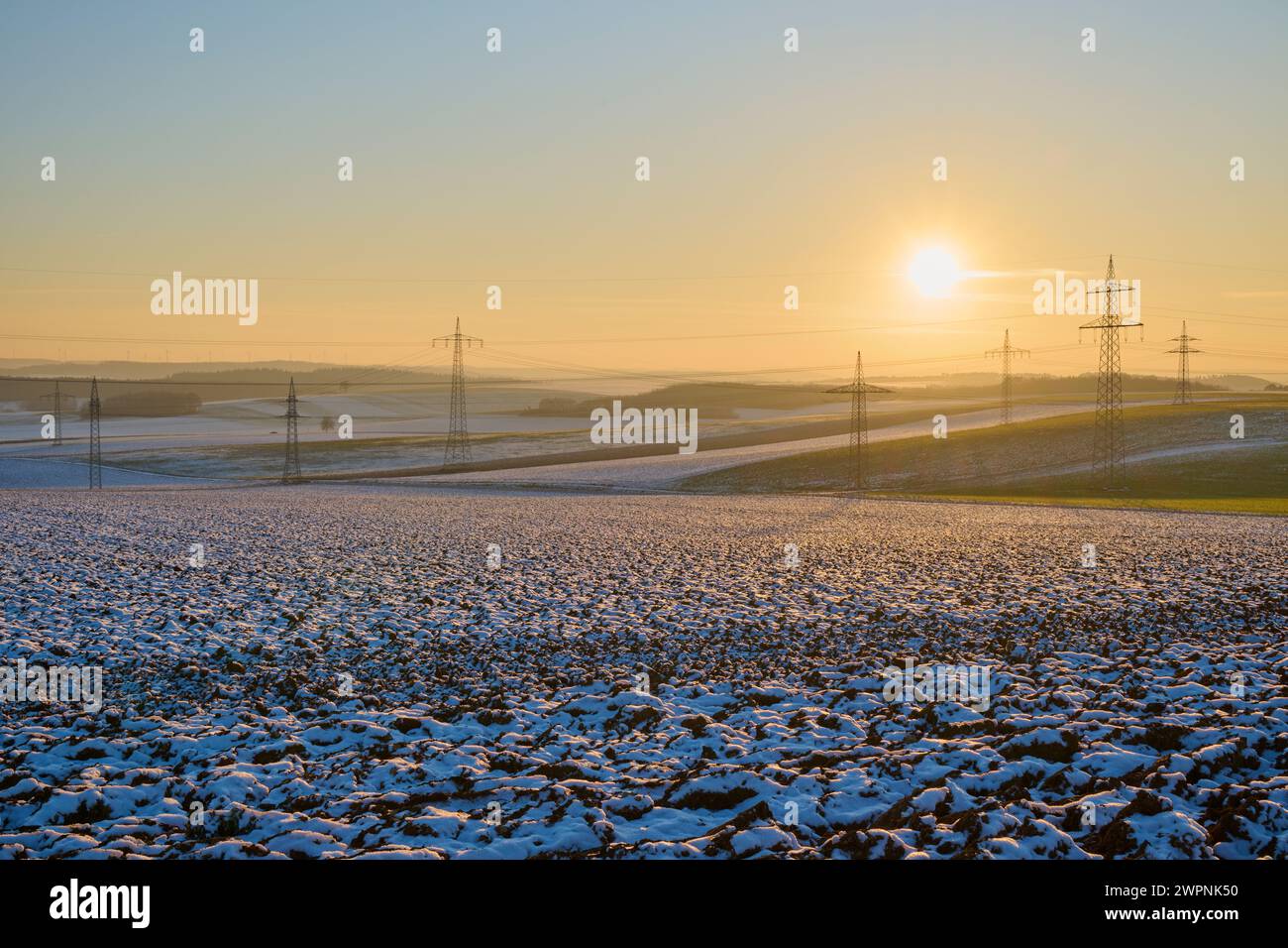 Landscape, power poles, power line, fields, snow, sunset, winter Stock ...