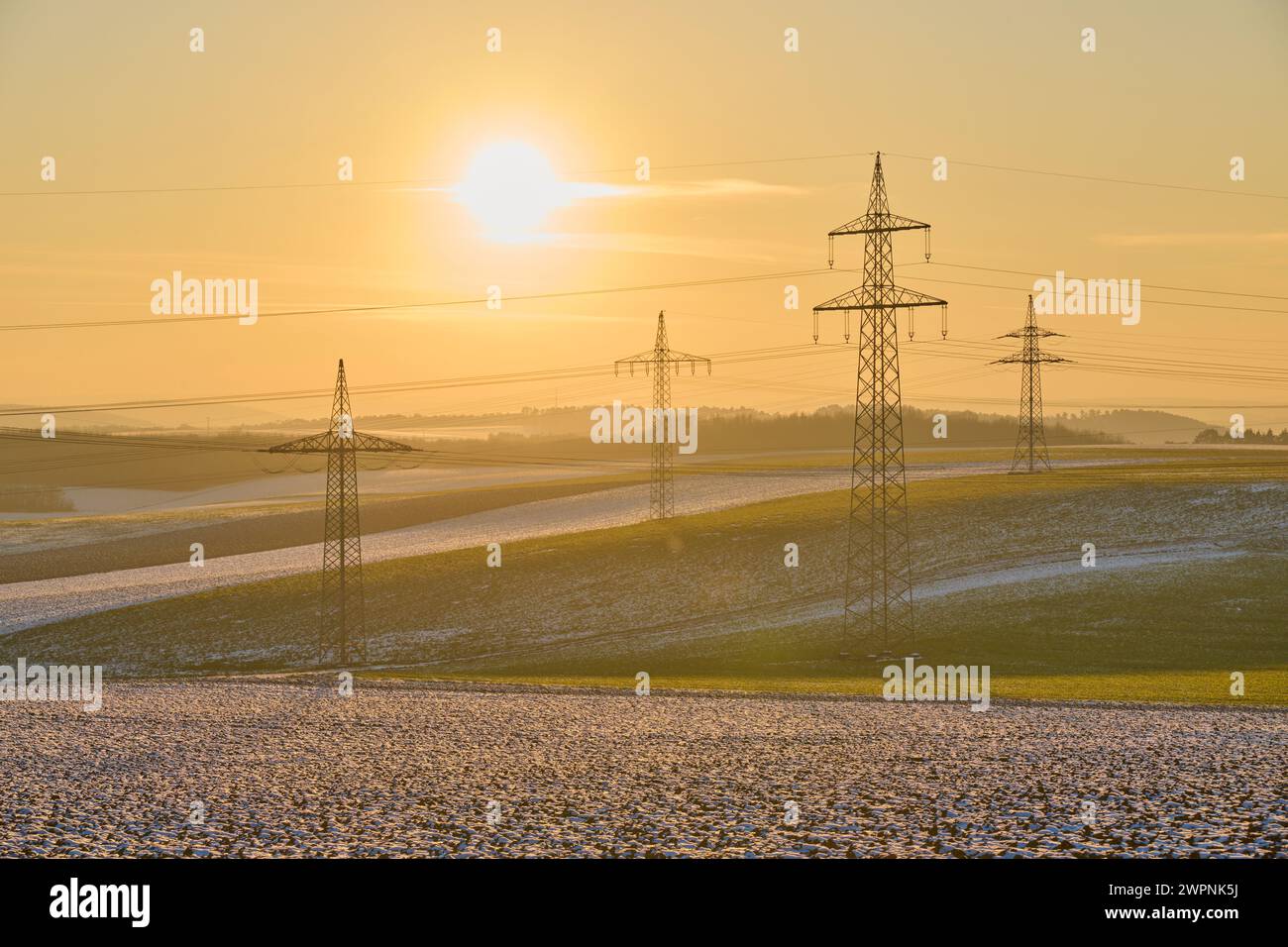 Landscape, power poles, power line, fields, snow, sunset, winter Stock ...