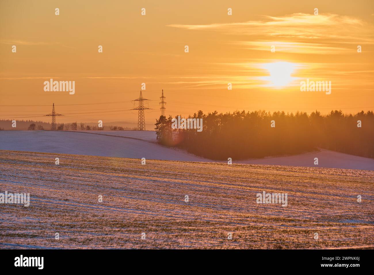 Landscape, power poles, power line, fields, snow, sunset, winter Stock ...