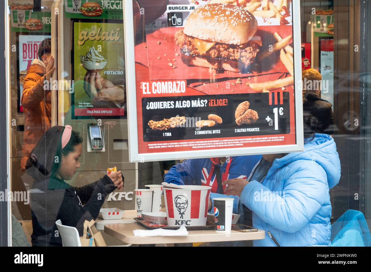 Customers are seen at the American fast food chicken restaurant chain ...