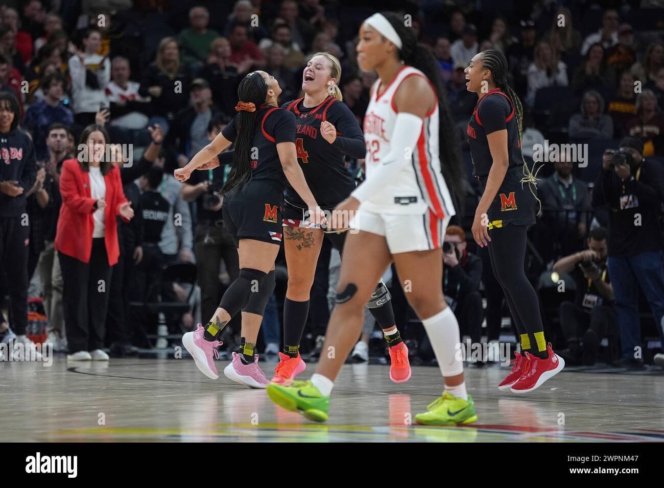 Maryland guard Brinae Alexander, left, forward Allie Kubek, center, and ...