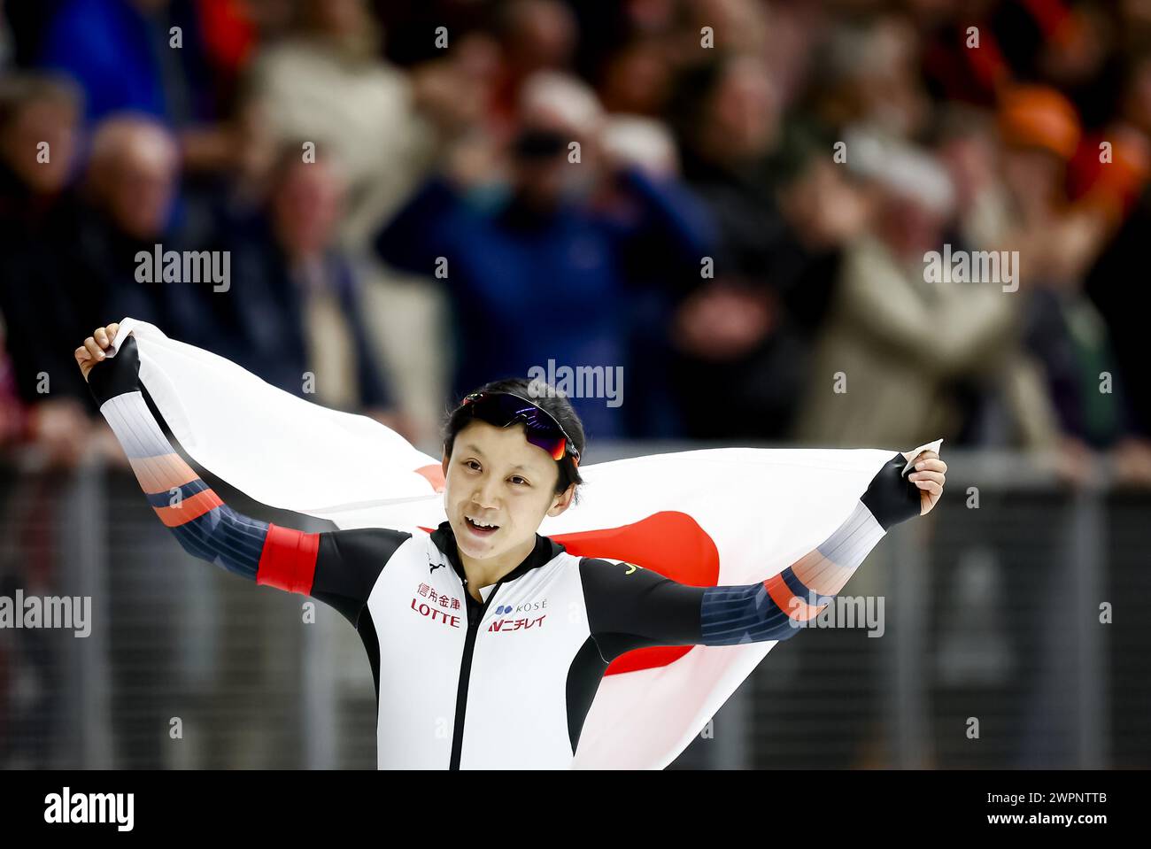 INZELL - Miho Takagi (JPN) reacts after winning gold at the end of the ...