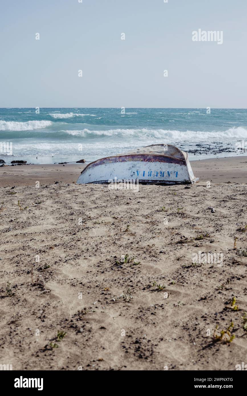 Inverted wooden boat on the sandy beach of Playa Honda, Lanzarote Stock ...