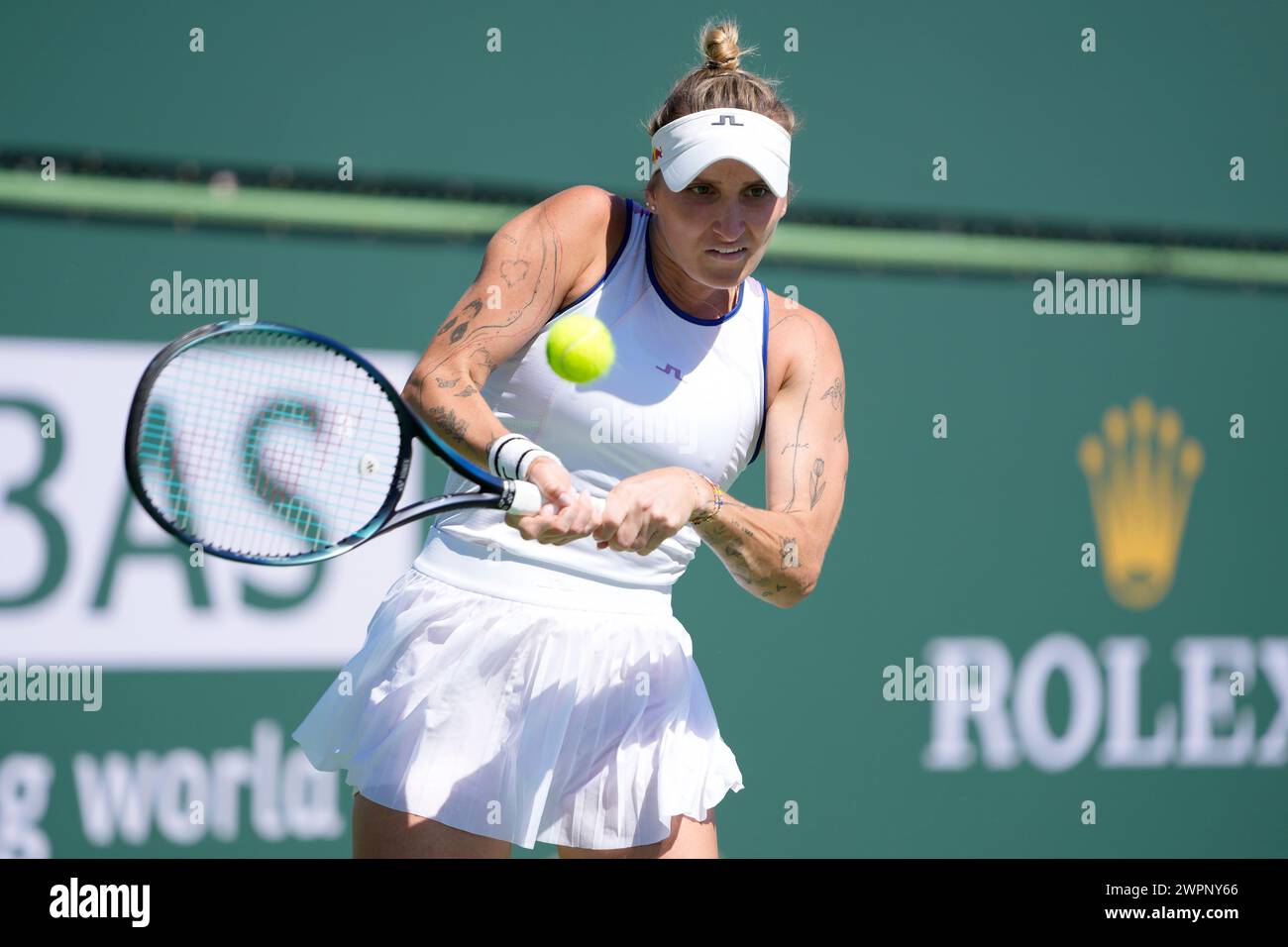 Marketa Vondrousova, of Czechia, returns a shot against Bernarda Pera ...