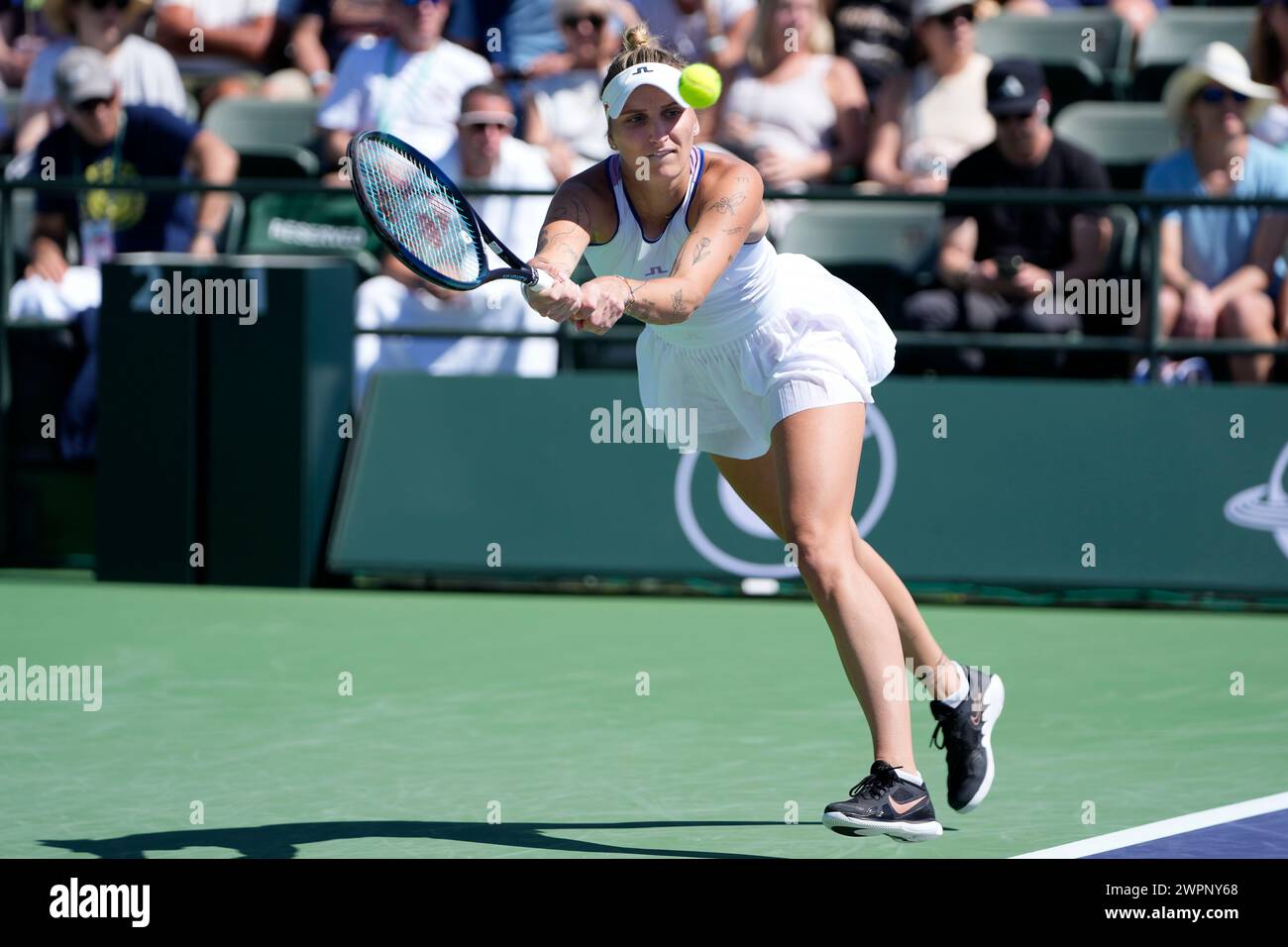 Marketa Vondrousova, of Czechia, returns a shot against Bernarda Pera ...