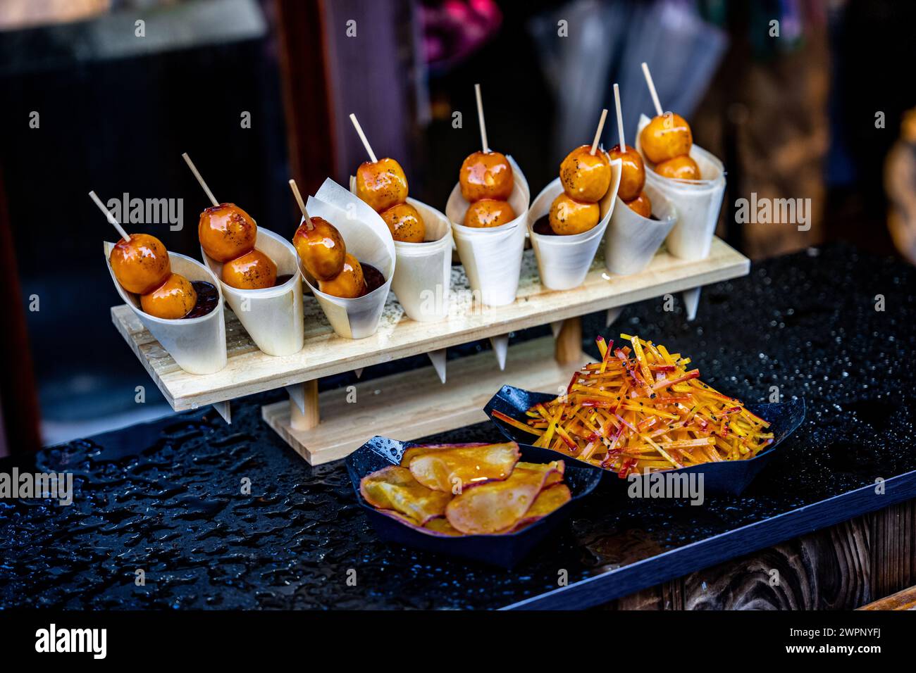 Various Japanese street food snacks available for purchase in Kyoto ...