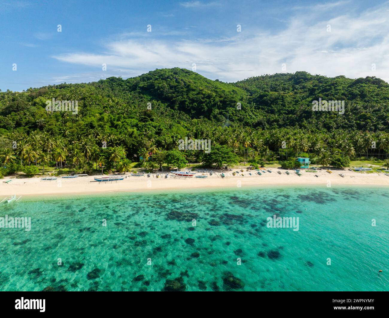 Fishing boats over white sand beach in Cobrador Island. Romblon ...