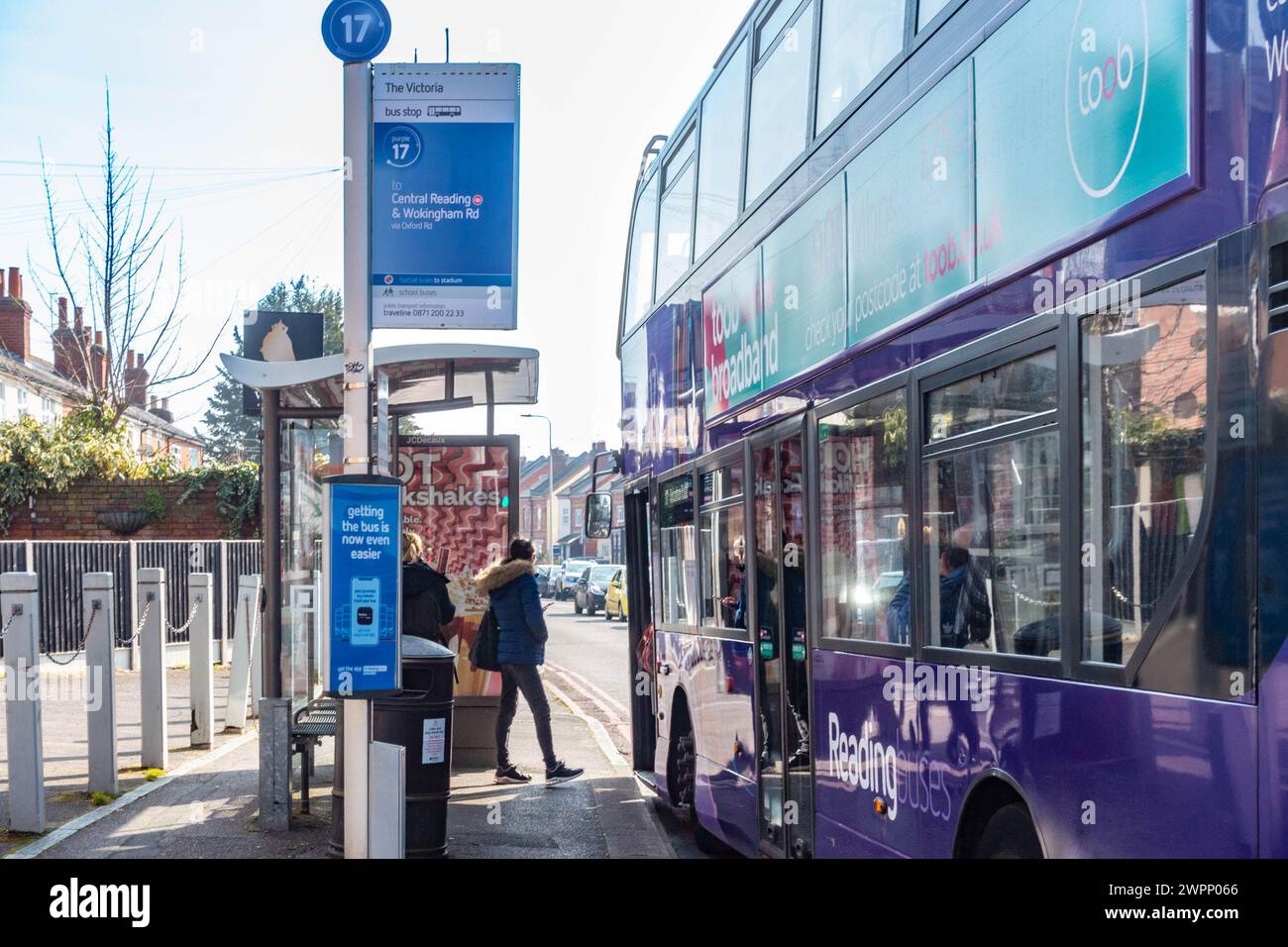 People board the no. 17 bus from Tilehurst to Central Reading at the ...