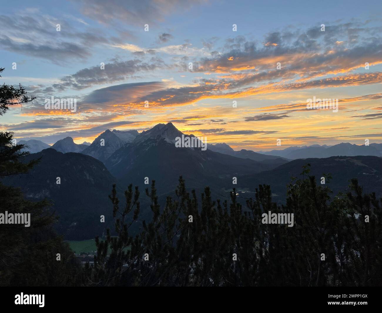 View from the Mittenwalder Hütte in the sunset light to Mittenwald and ...