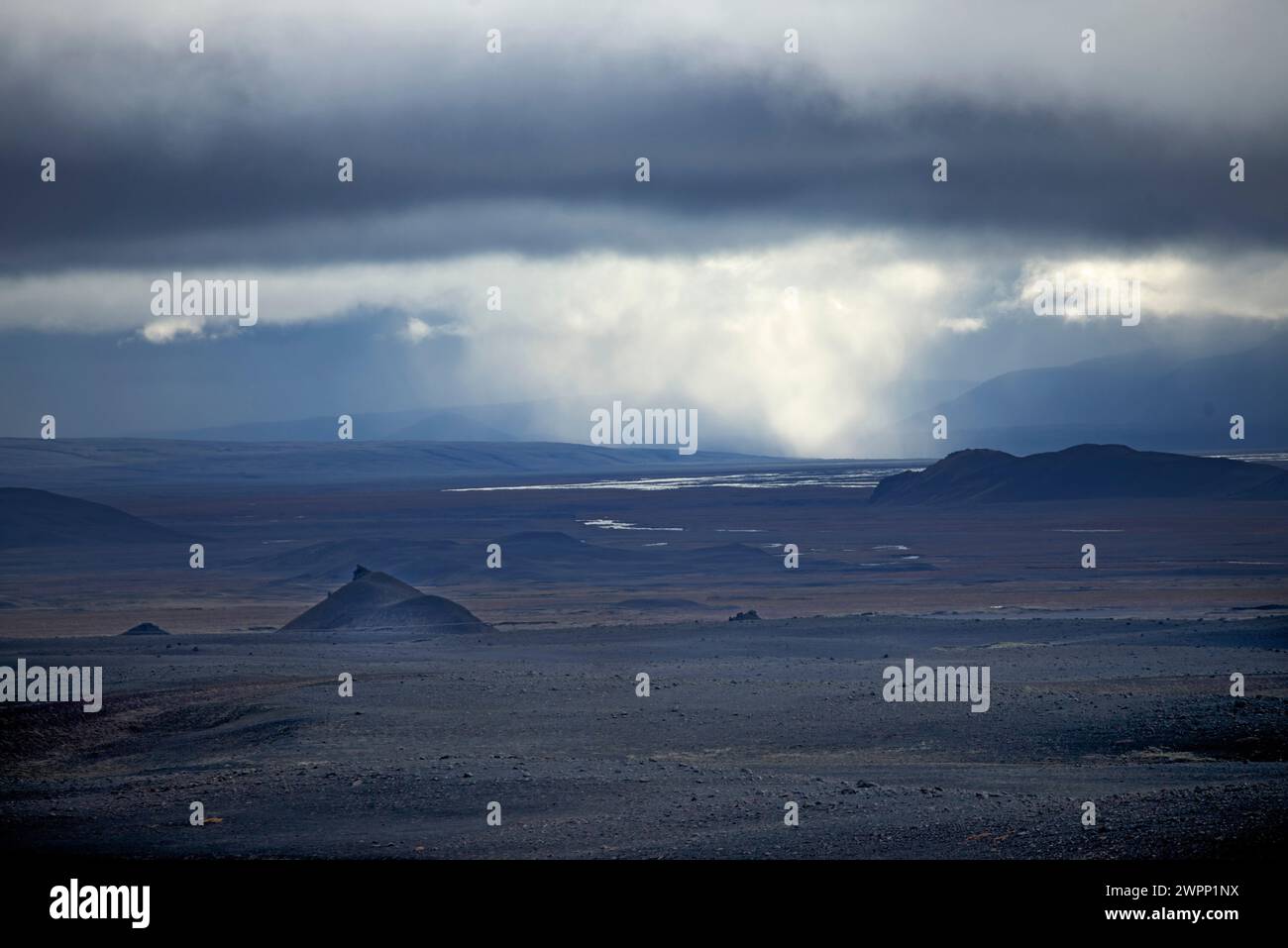 Rain showers over the volcanic landscape of Joekuldaheidi in northeast ...