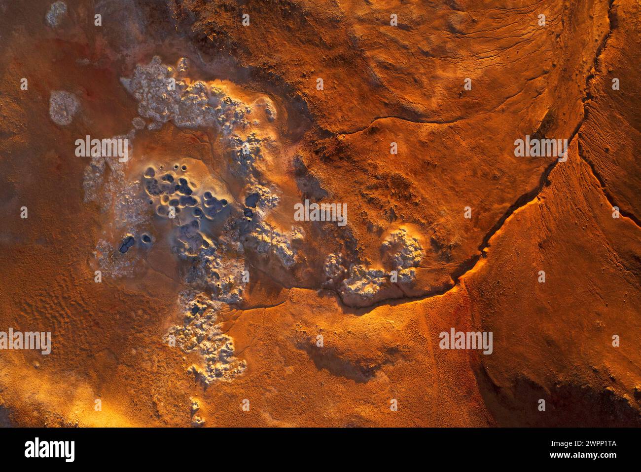 Aerial view of the slopes and fumaroles of Namafjall glowing in the ...