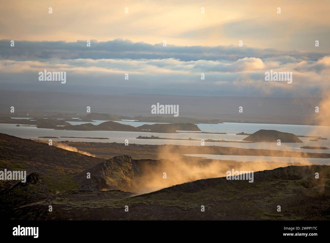 Steam clouds glowing in the evening sun from the fumaroles of the ...