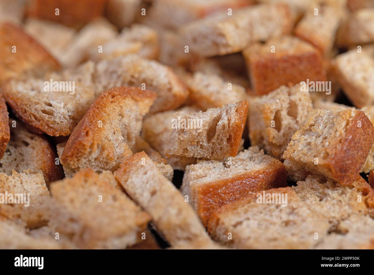 Toasted bread cubes in a closeup Stock Photo - Alamy