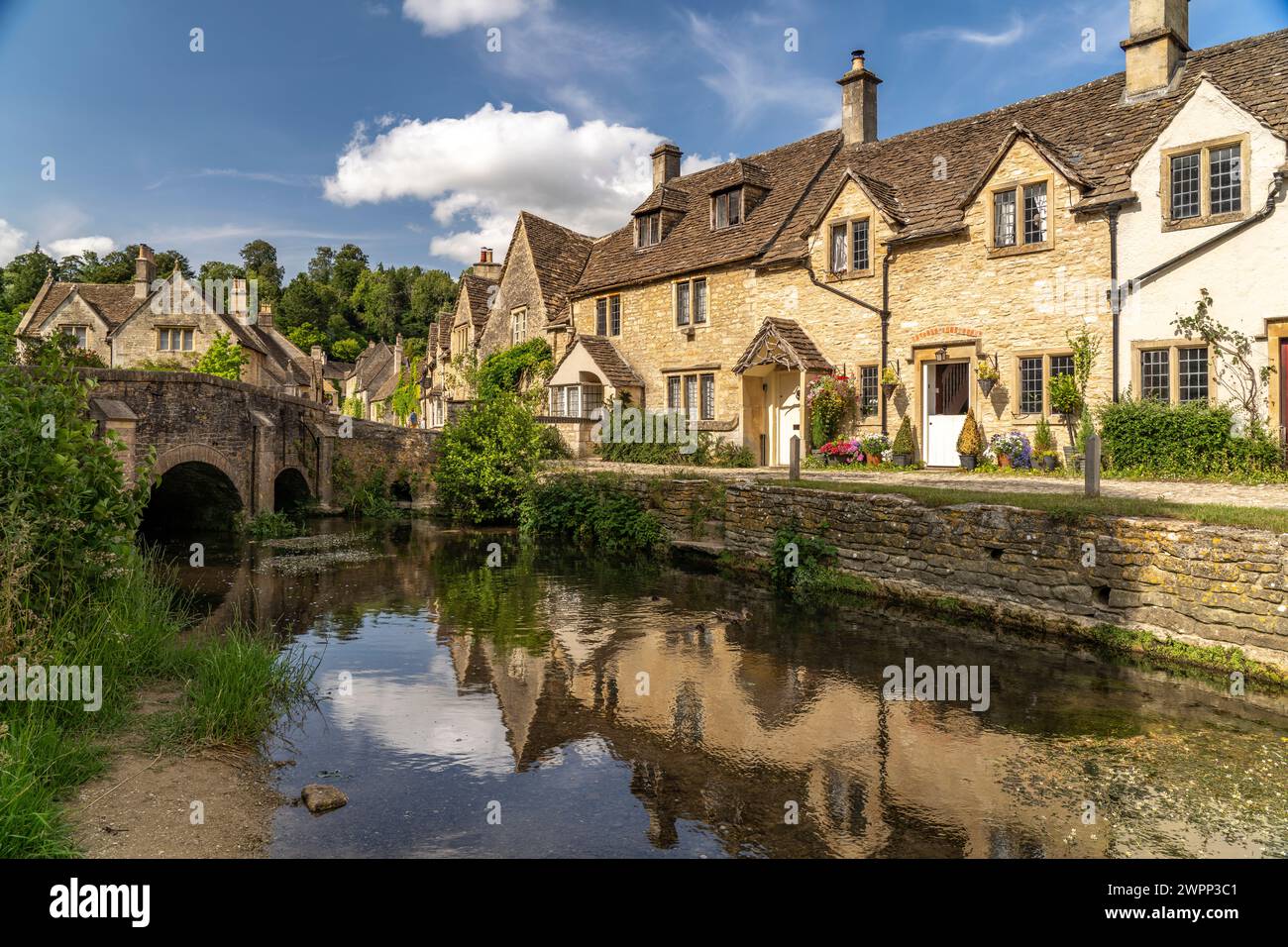 The village of castle combe on the river bybrook hi-res stock ...