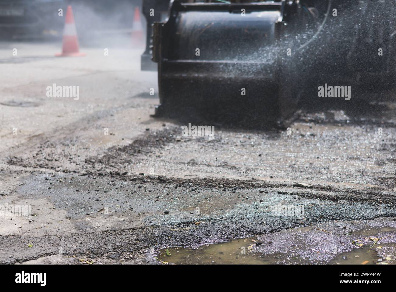 Process of asphalting, blacktopping and paving, asphalt paver machine ...