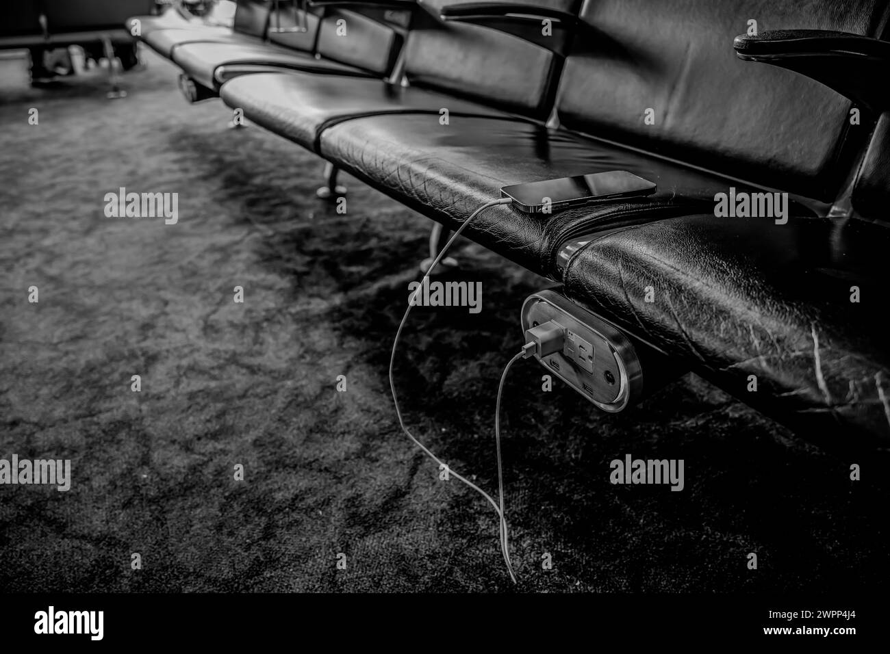 Selective focus on airport terminal phone charging outlet station Stock ...