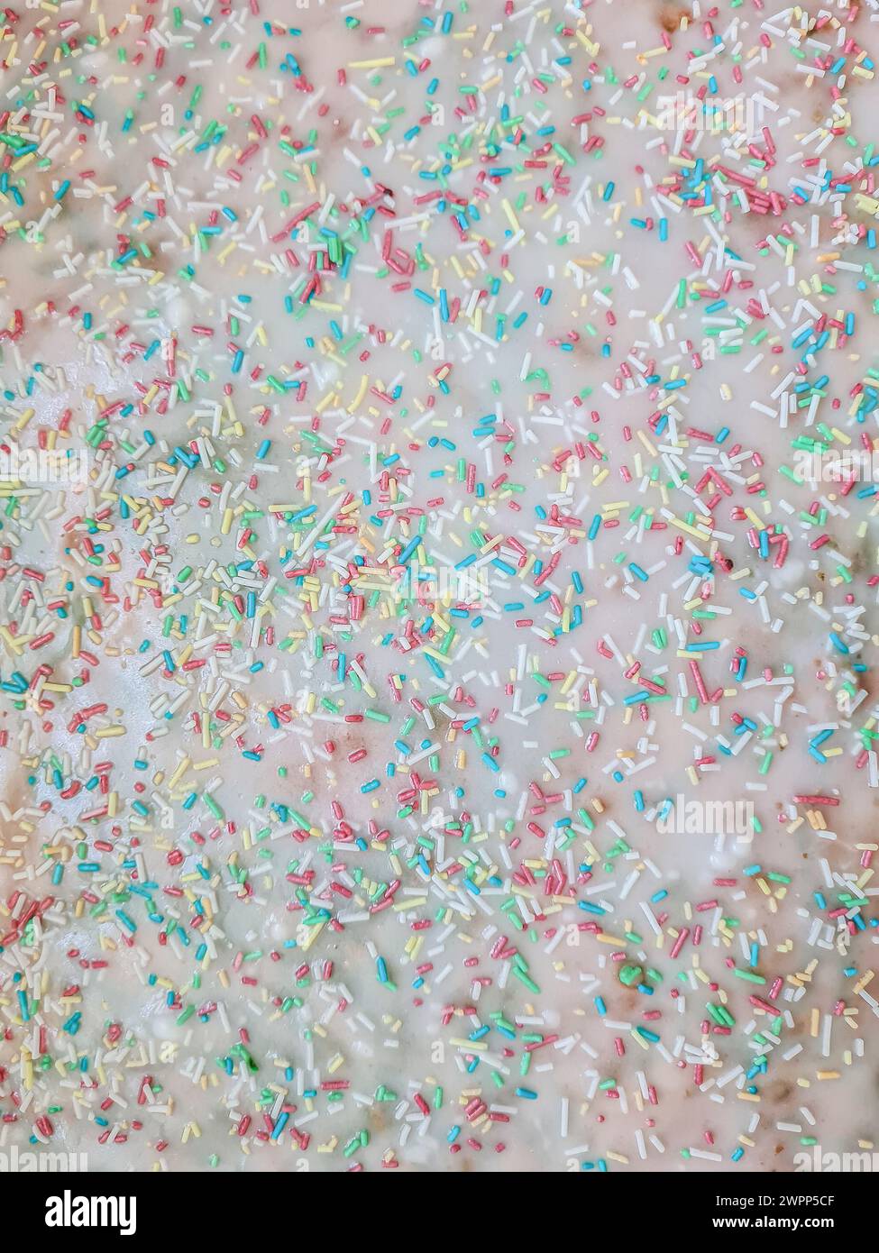 Close-up of children's cake with colorful sugar sprinkles, birthday ...