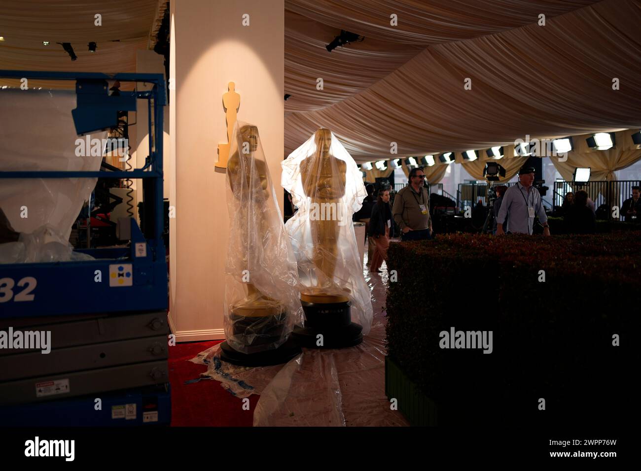 Plastic covers Oscars statues along the red carpet ahead of the 96th ...