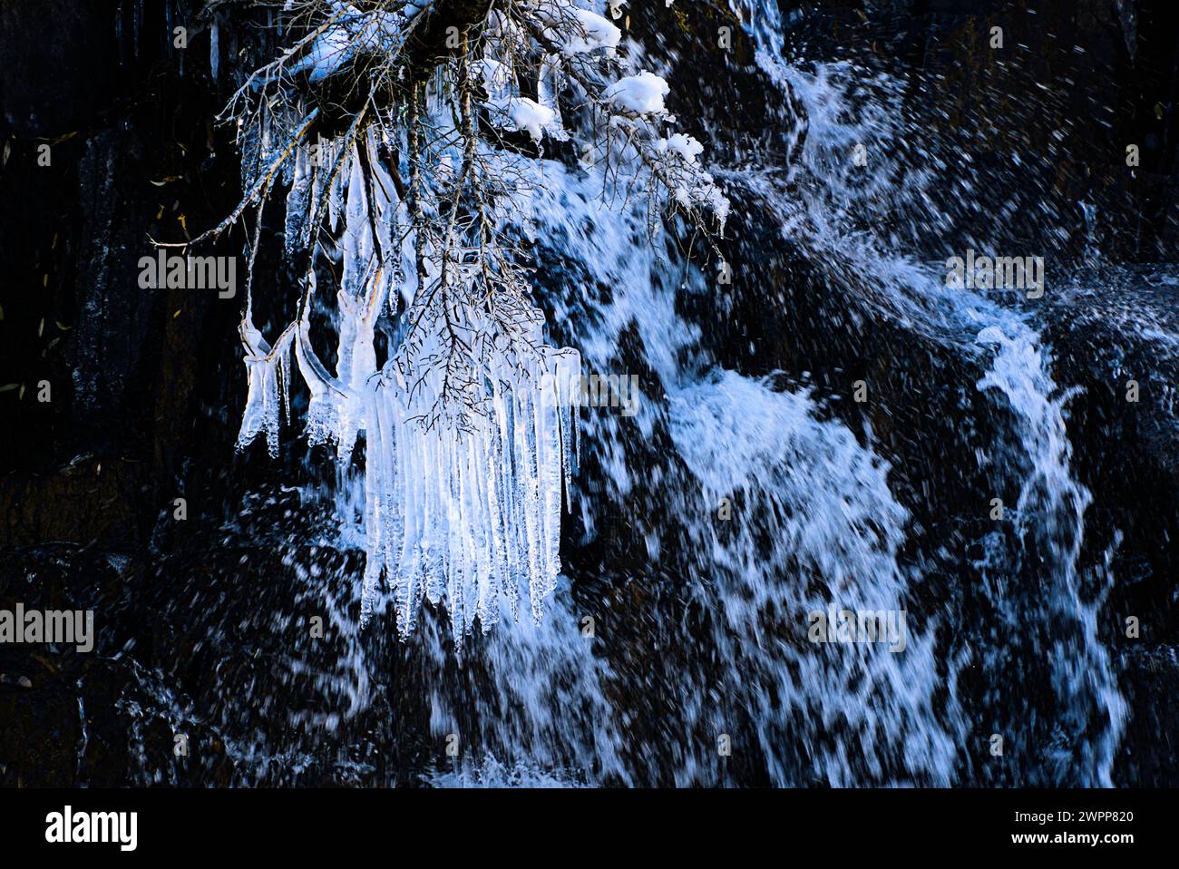 Frozen waterfalls on the black rock in Lundy Canyon, California Stock ...