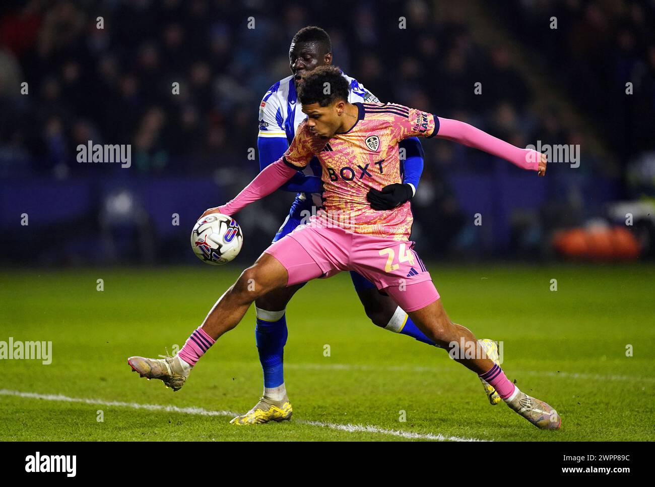 Leeds United's Georginio Rutter (front) and Sheffield Wednesday's Bambo ...