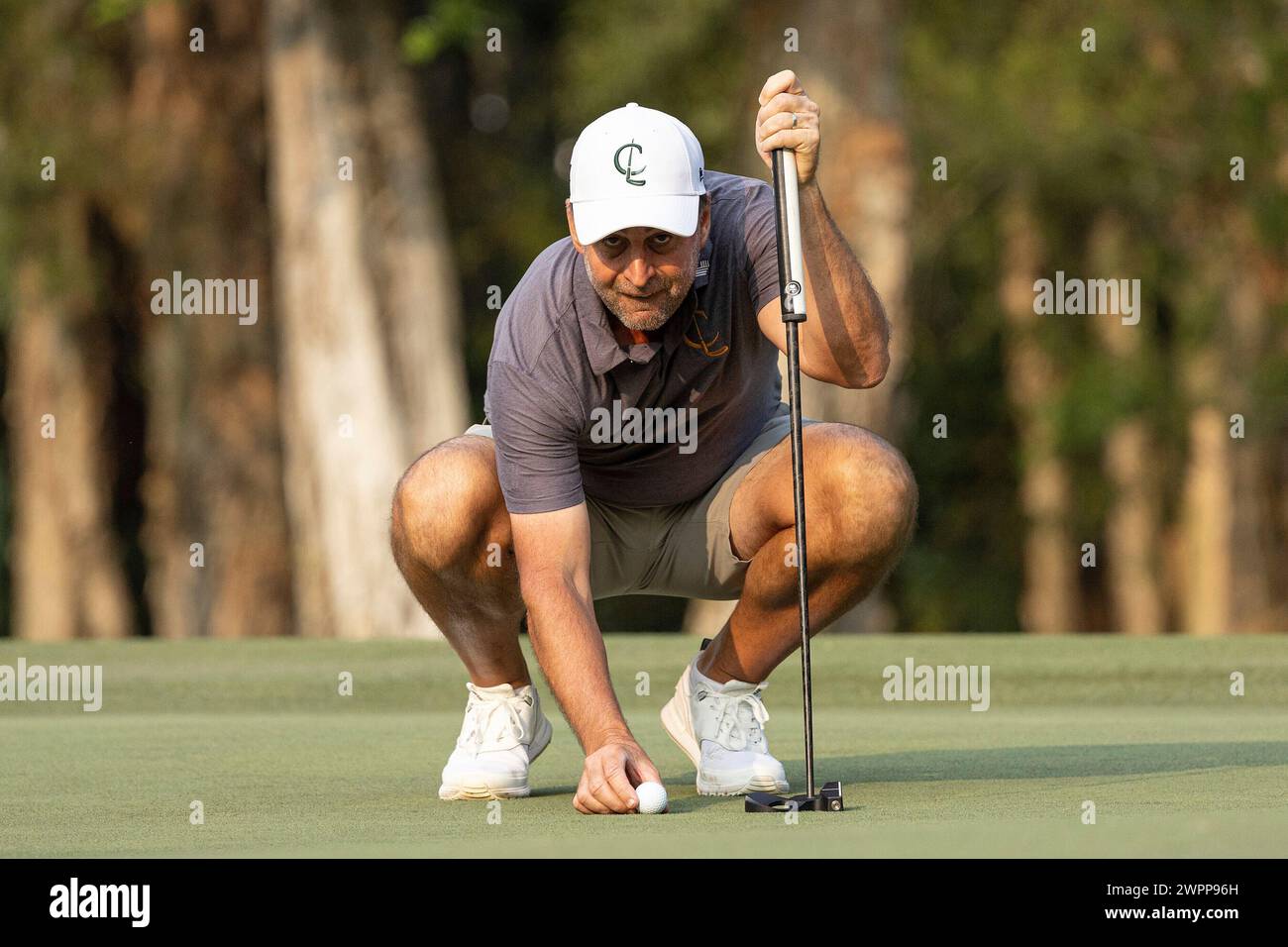 Richard Bland of Cleeks GC reads his putt on the fifth green during the ...