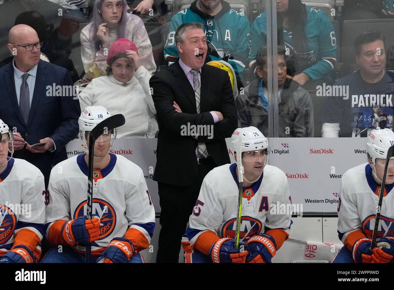 New York Islanders head coach Patrick Roy, standing, during an NHL ...