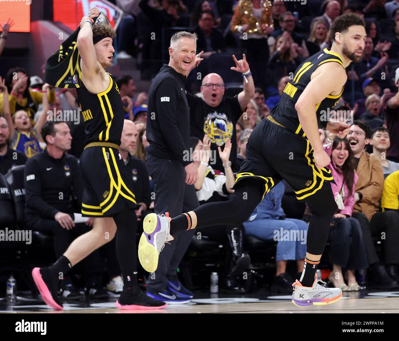Golden State Warriors' head coach Steve Kerr and Brandin Podziemski ...