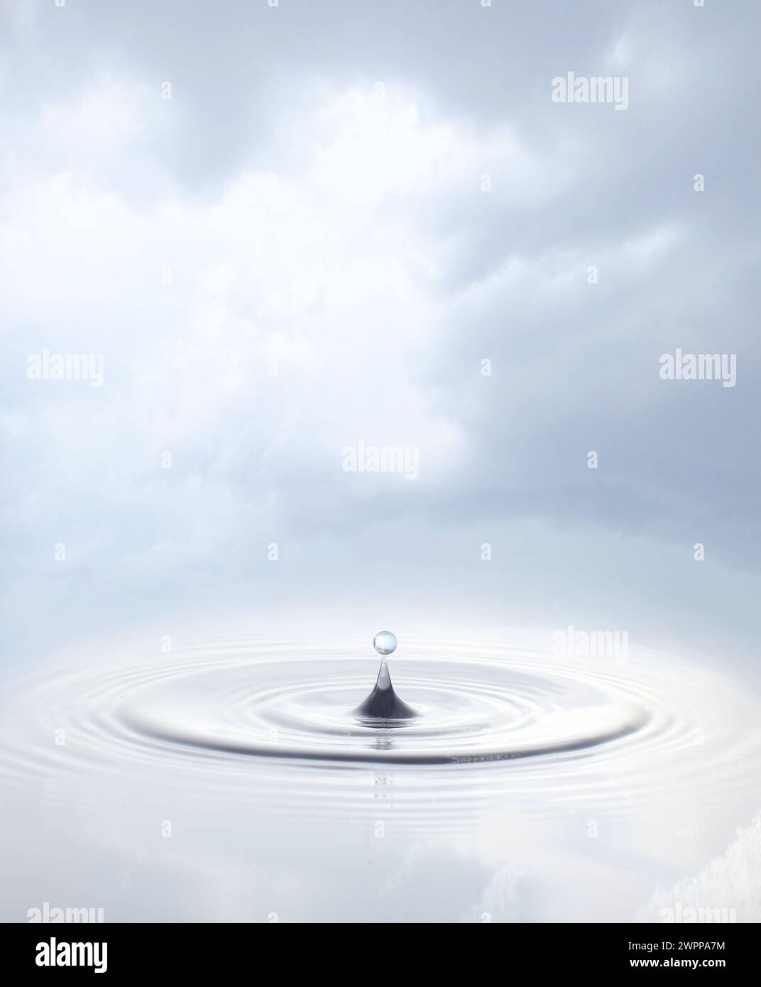Drop water surface and abstract sky with airy clouds Stock Photo - Alamy