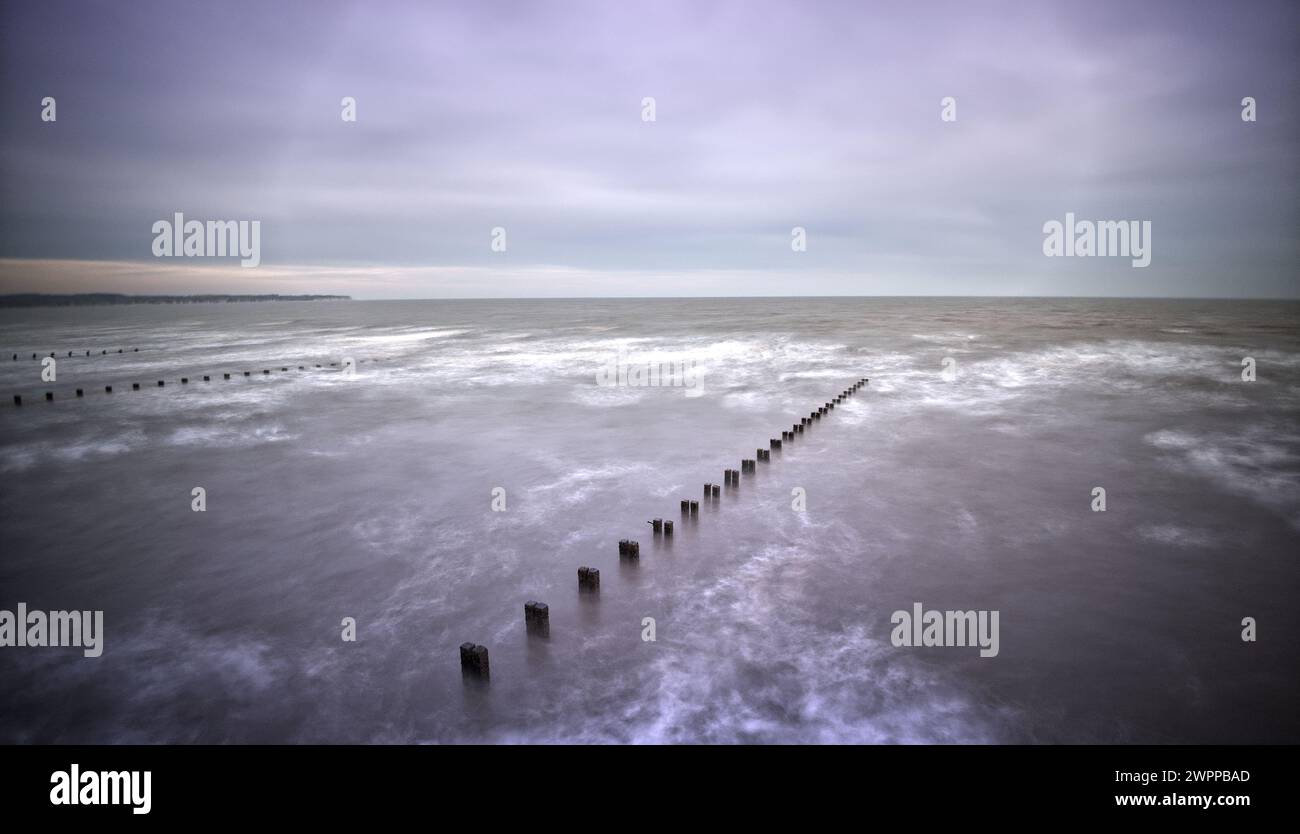 Groynes on the beach at Bridlington in Yorkshire protecting the ...
