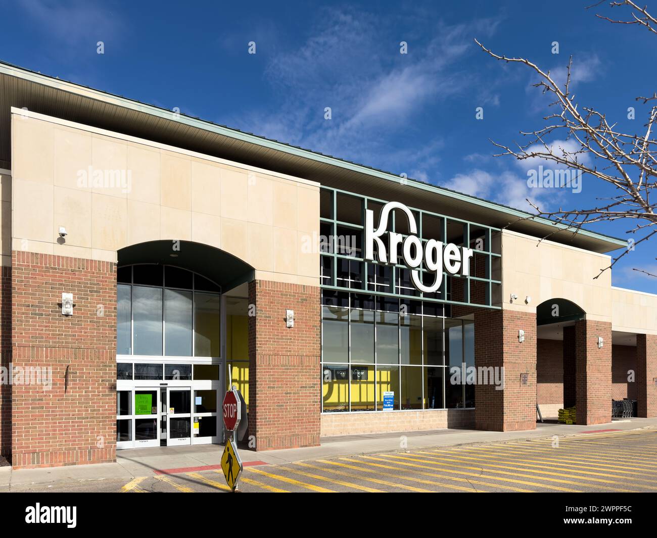Kroger grocery store front entrance and logo. The Kroger Company is an American supermarket ...