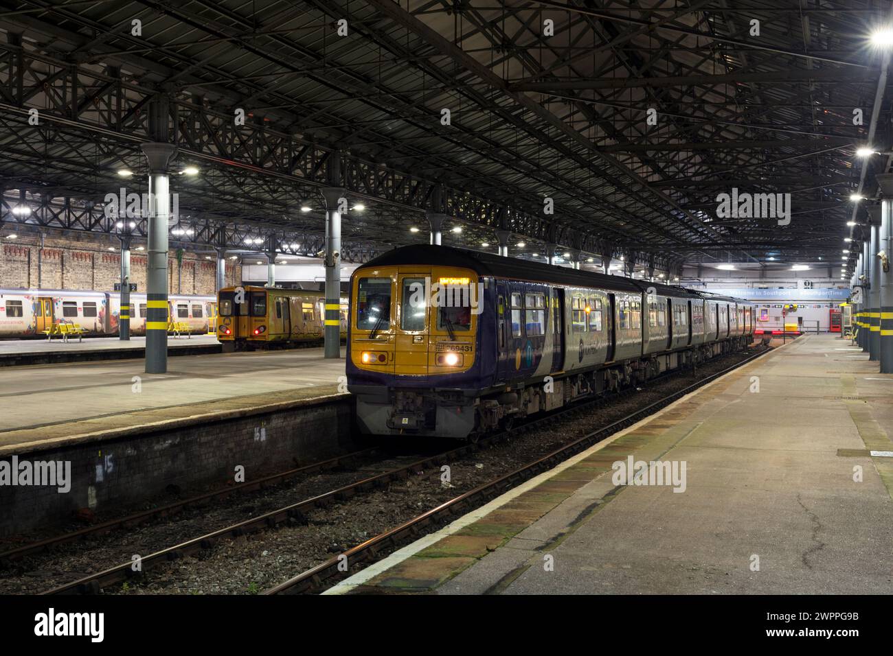 Northern Rail class 769 bi - mode train (right) with a Merseyrail ...