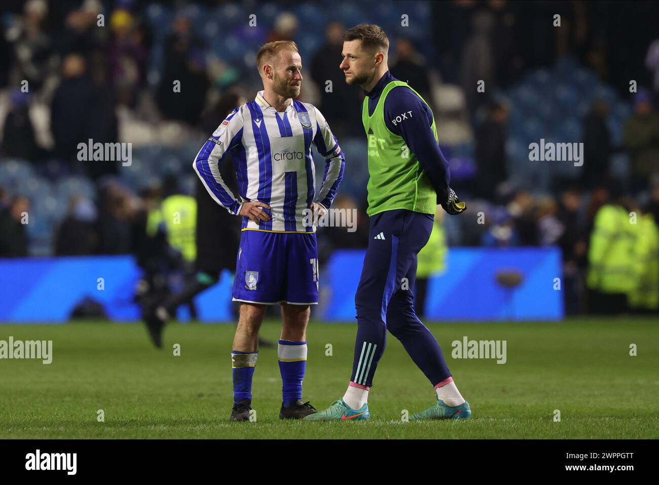Barry Bannan (Sheffield Wednesday) chats with Liam Cooper (Leeds United ...
