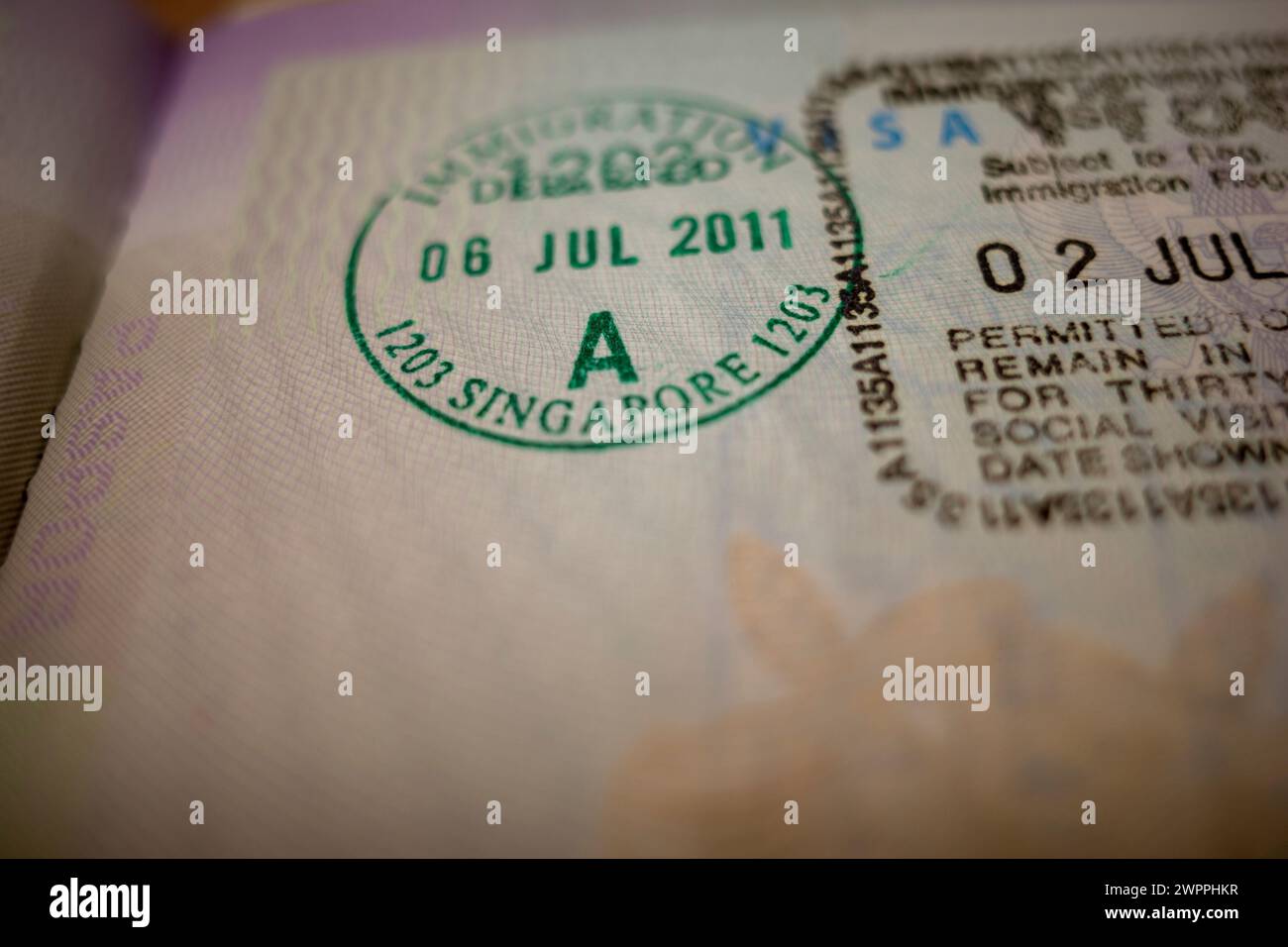 Visa stamp, visum in a passport, shallow focus. Traveling and legal ...