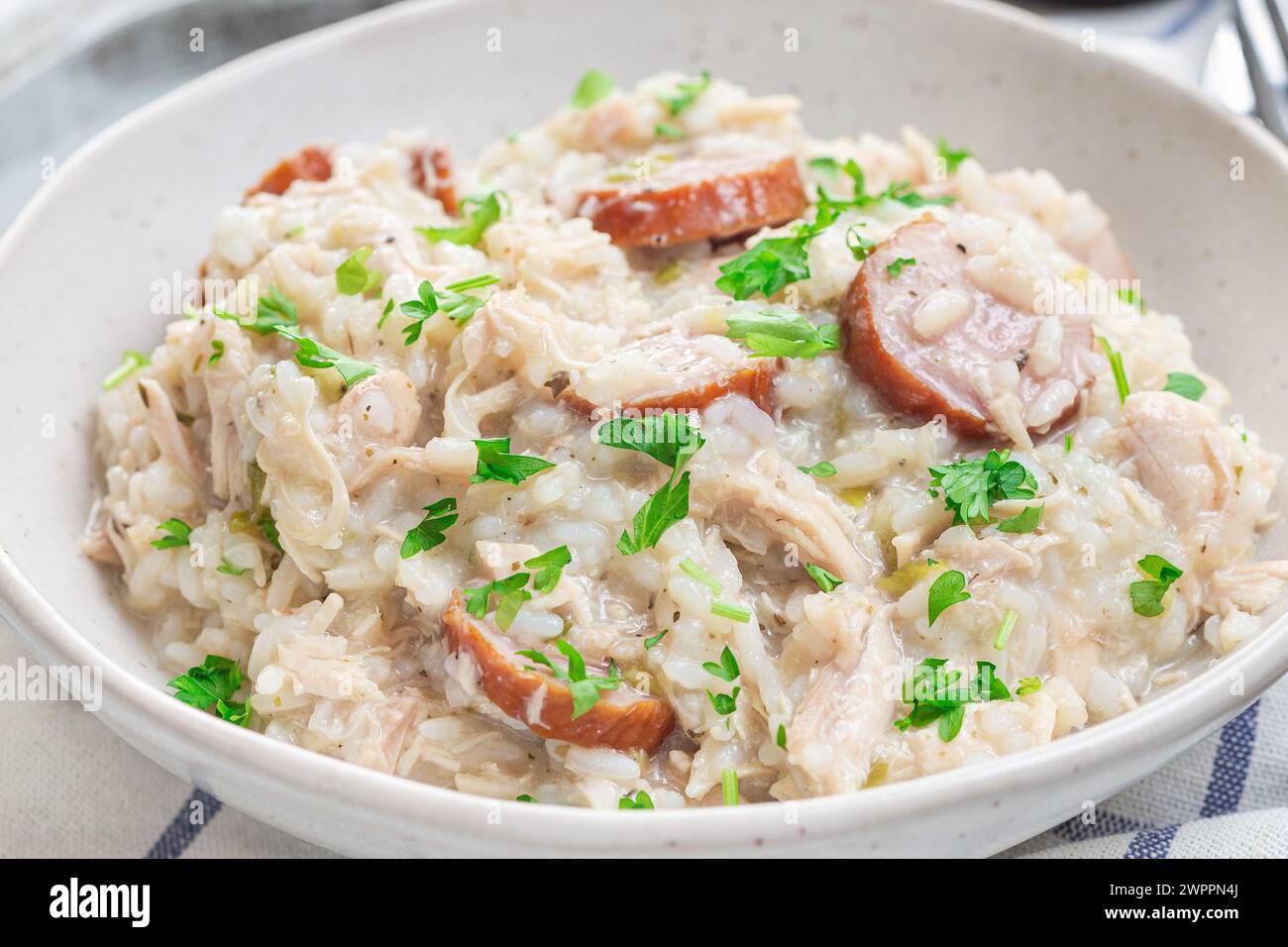 Traditional South Carolina chicken bog dish with smocked sausages, in a ...