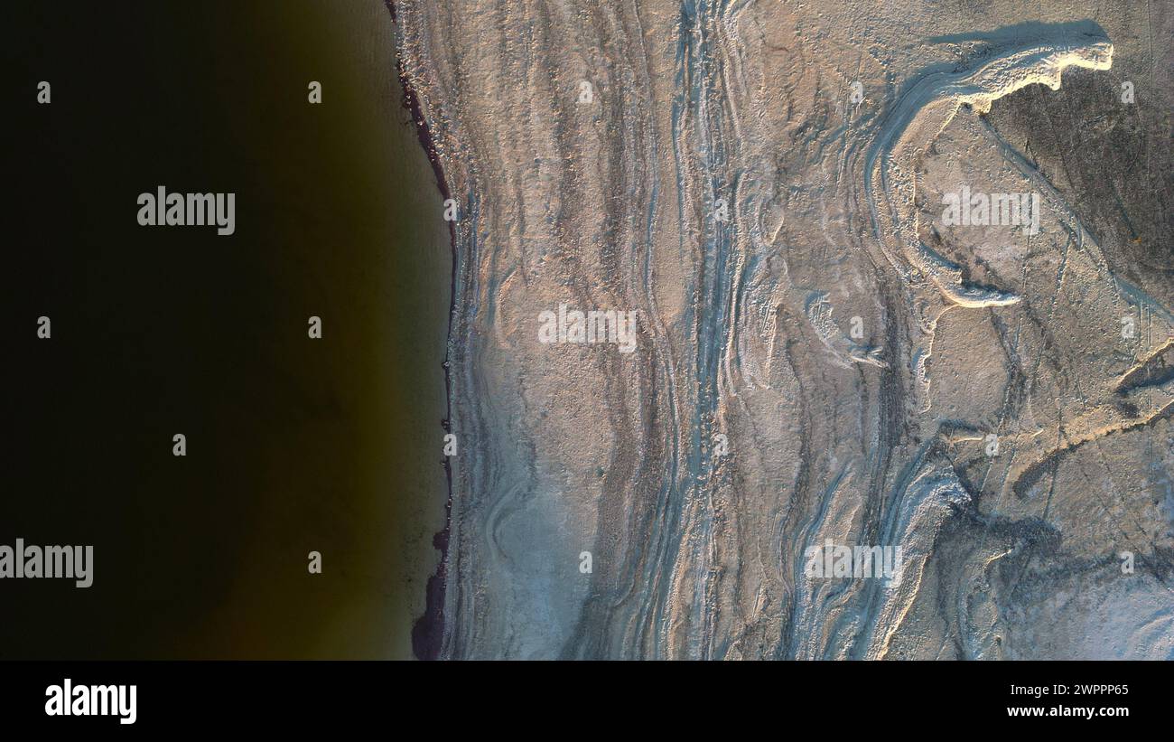 Aerial view of shoreline shapes in the sand Stock Photo - Alamy