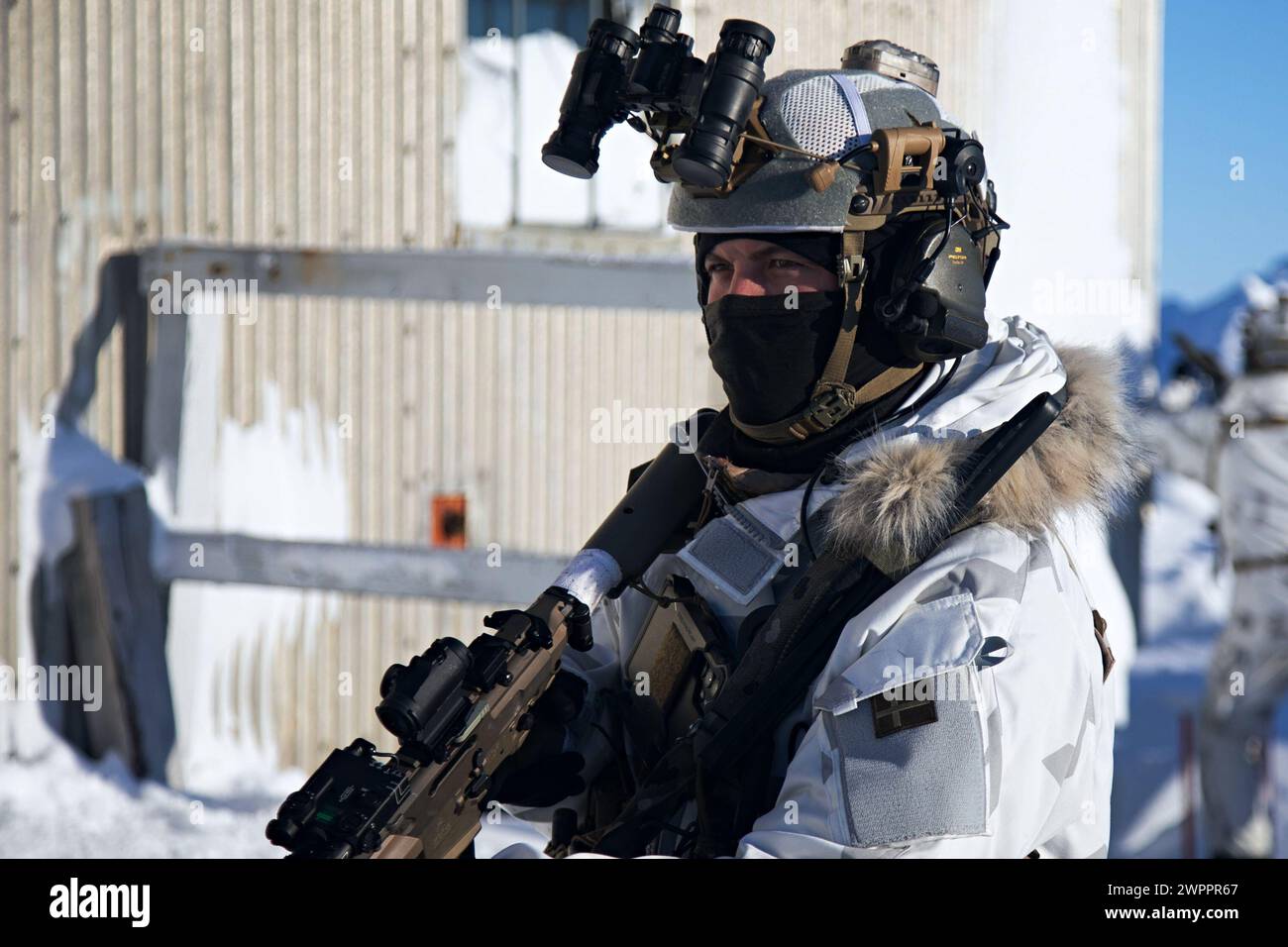 A Danish Special Operator provides overwatch in Utqiagvik, Alaska ...