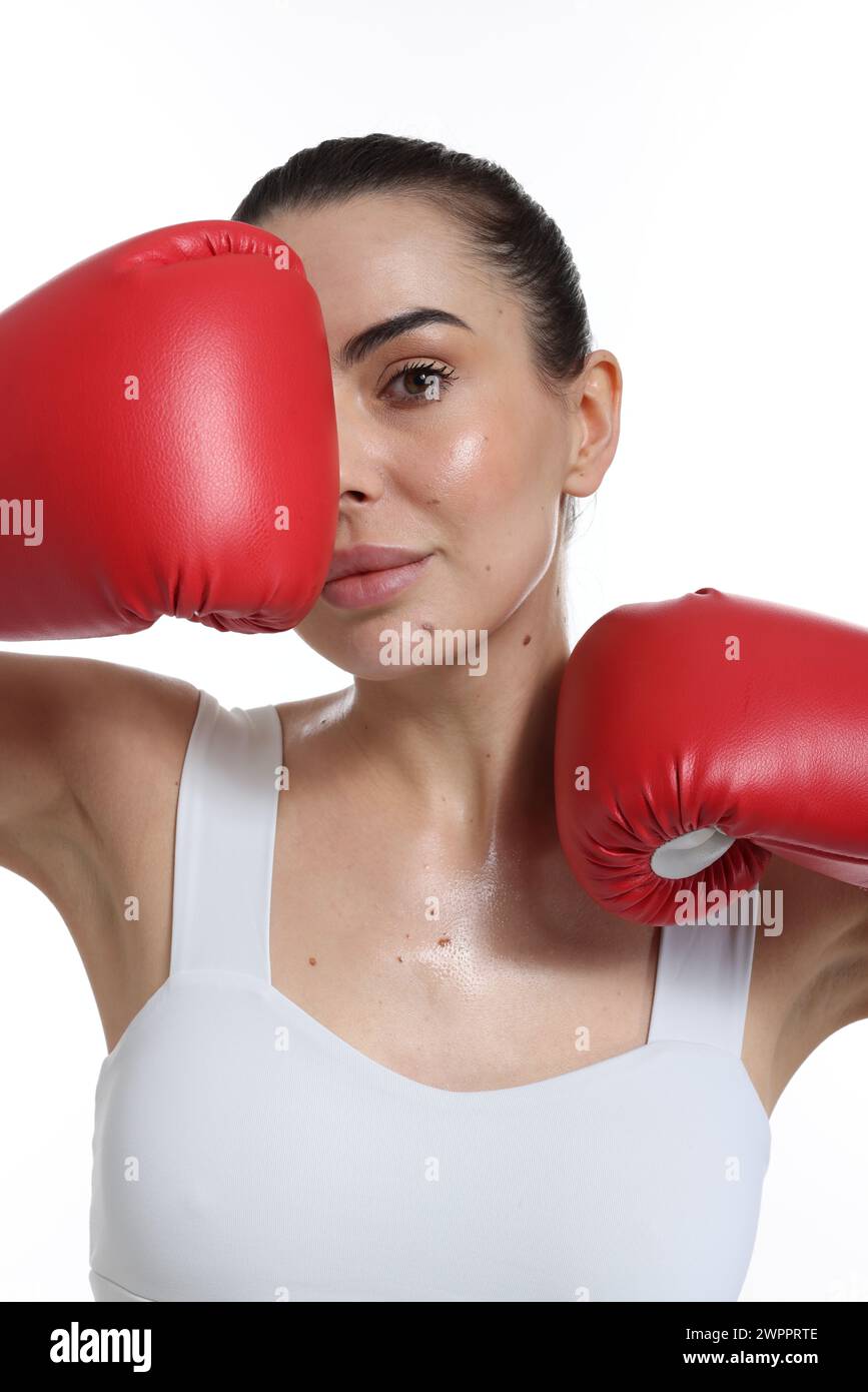 Beautiful woman in boxing gloves on white background Stock Photo - Alamy