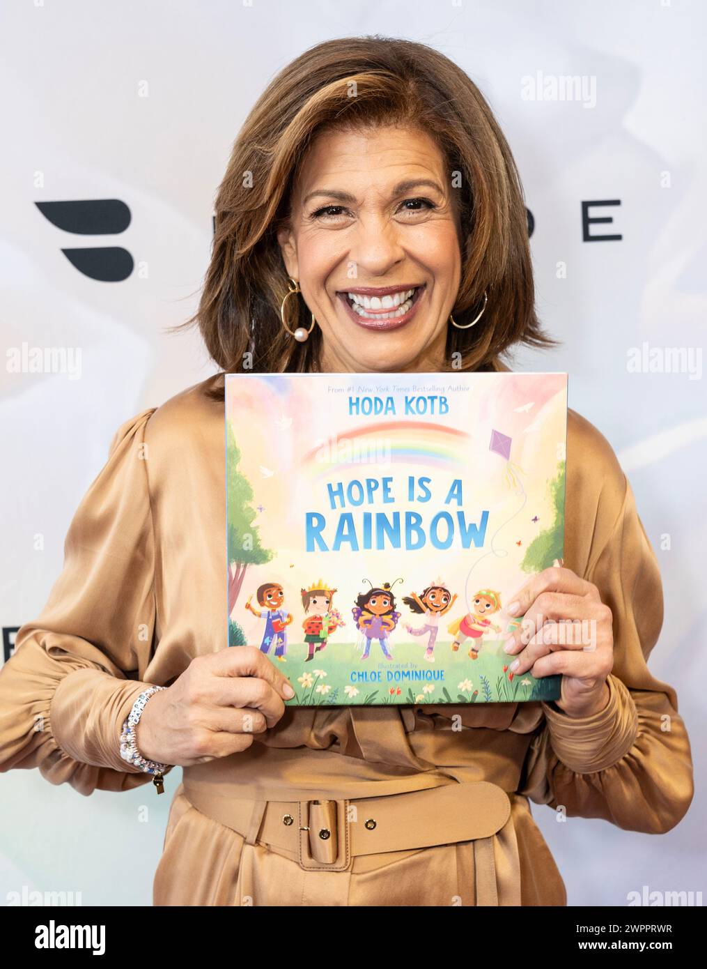 Hoda Kotb holding her new children's book attends Hudson River Park ...