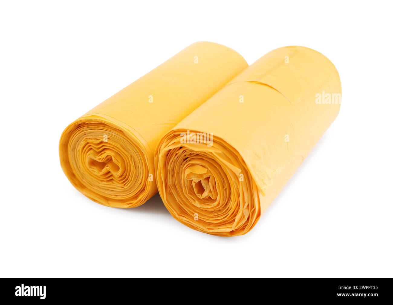 Two rolls of yellow garbage bags isolated on white Stock Photo - Alamy