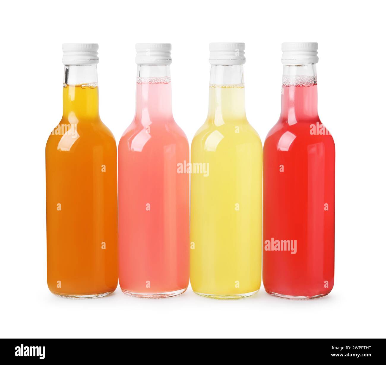 Delicious kombucha in glass bottles isolated on white Stock Photo - Alamy