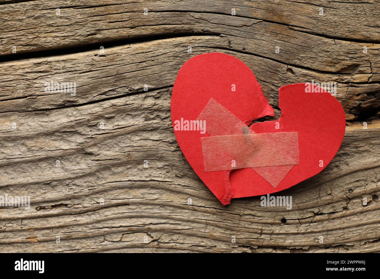 Broken heart bandages hi-res stock photography and images - Alamy