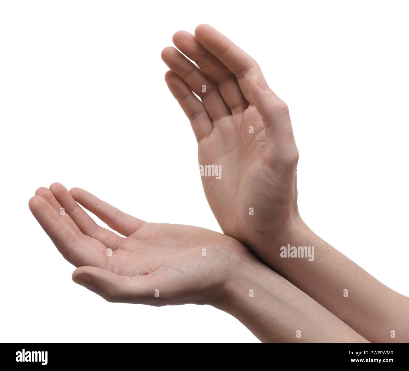 Man holding something in hands on white background, closeup Stock Photo ...