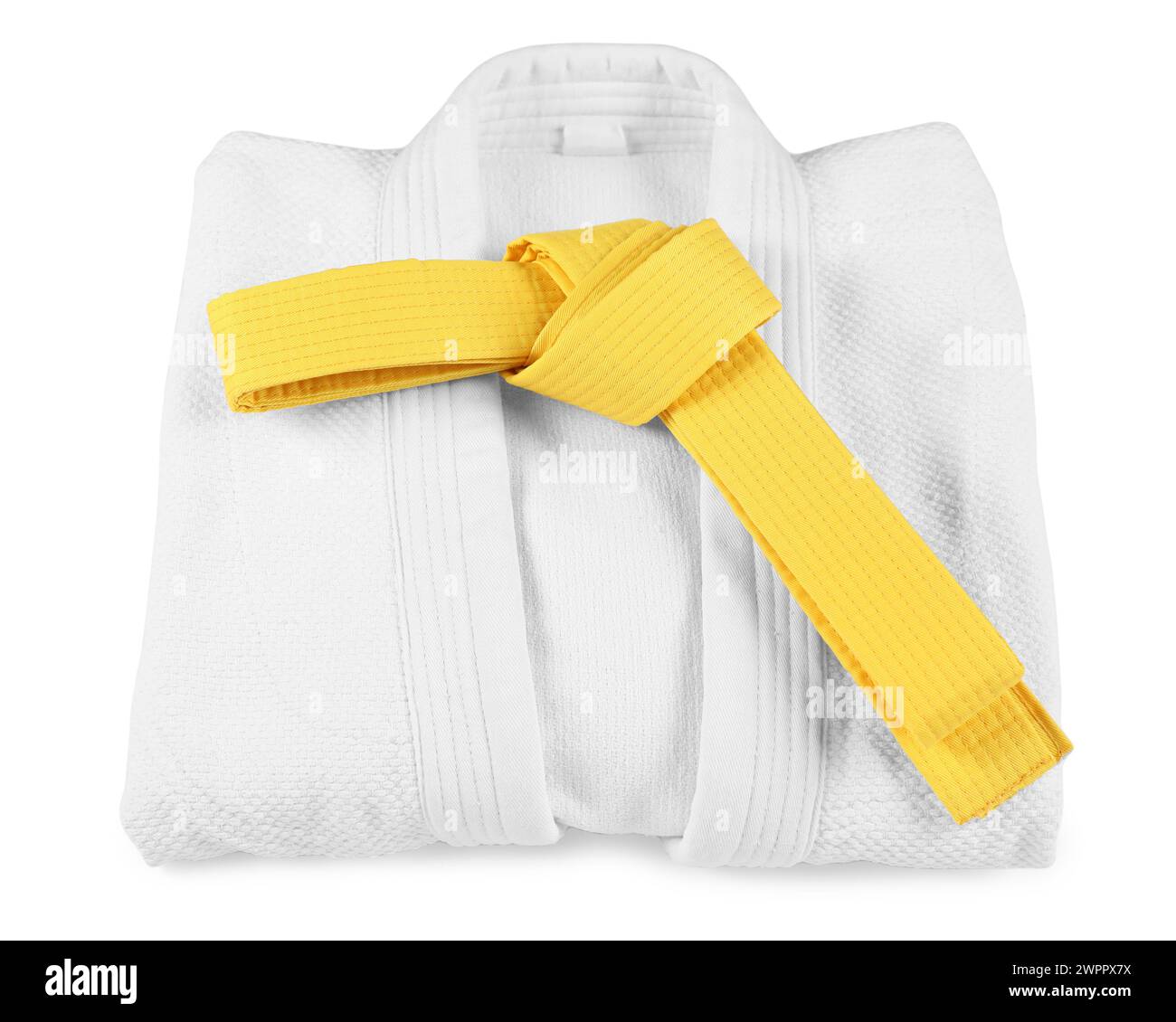 Yellow karate belt and kimono isolated on white Stock Photo - Alamy