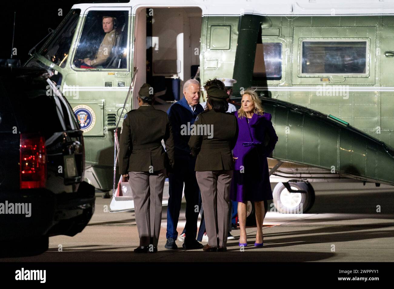 President Joe Biden and first lady Jill Biden are greeted by Command ...