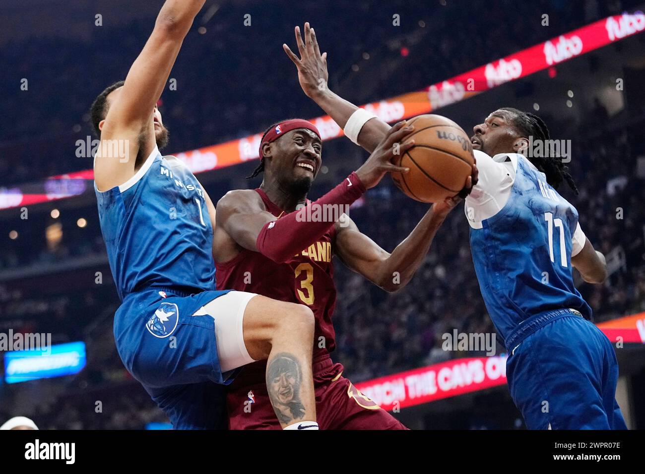 Minnesota Timberwolves forward Jaden McDaniels (3) drives between ...
