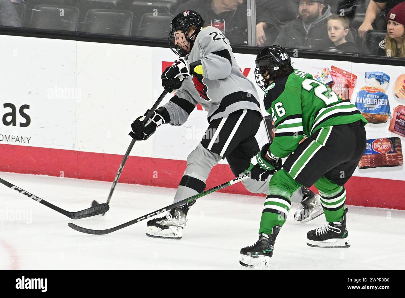 Omaha Mavericks forward Jimmy Glynn (22) shoots the puck during a NCAA ...