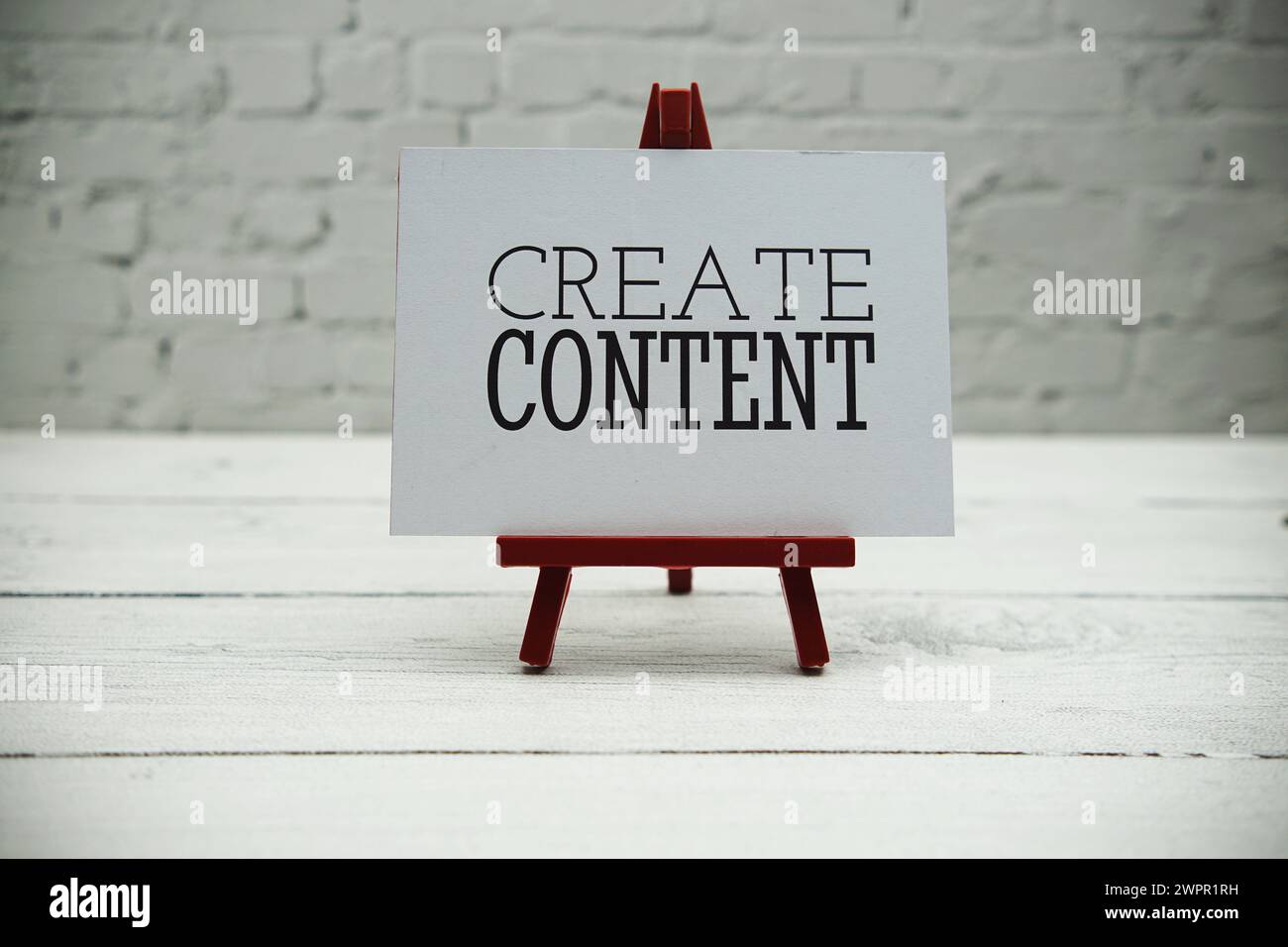 Create Content text on white brick wall and wooden background Stock ...