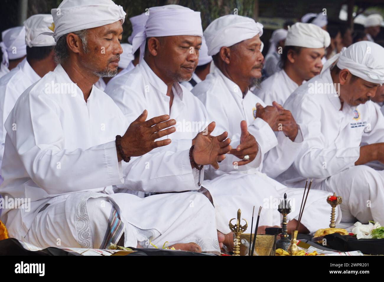 Hindus carry out prayers in the context of the Melasti ceremony ahead ...