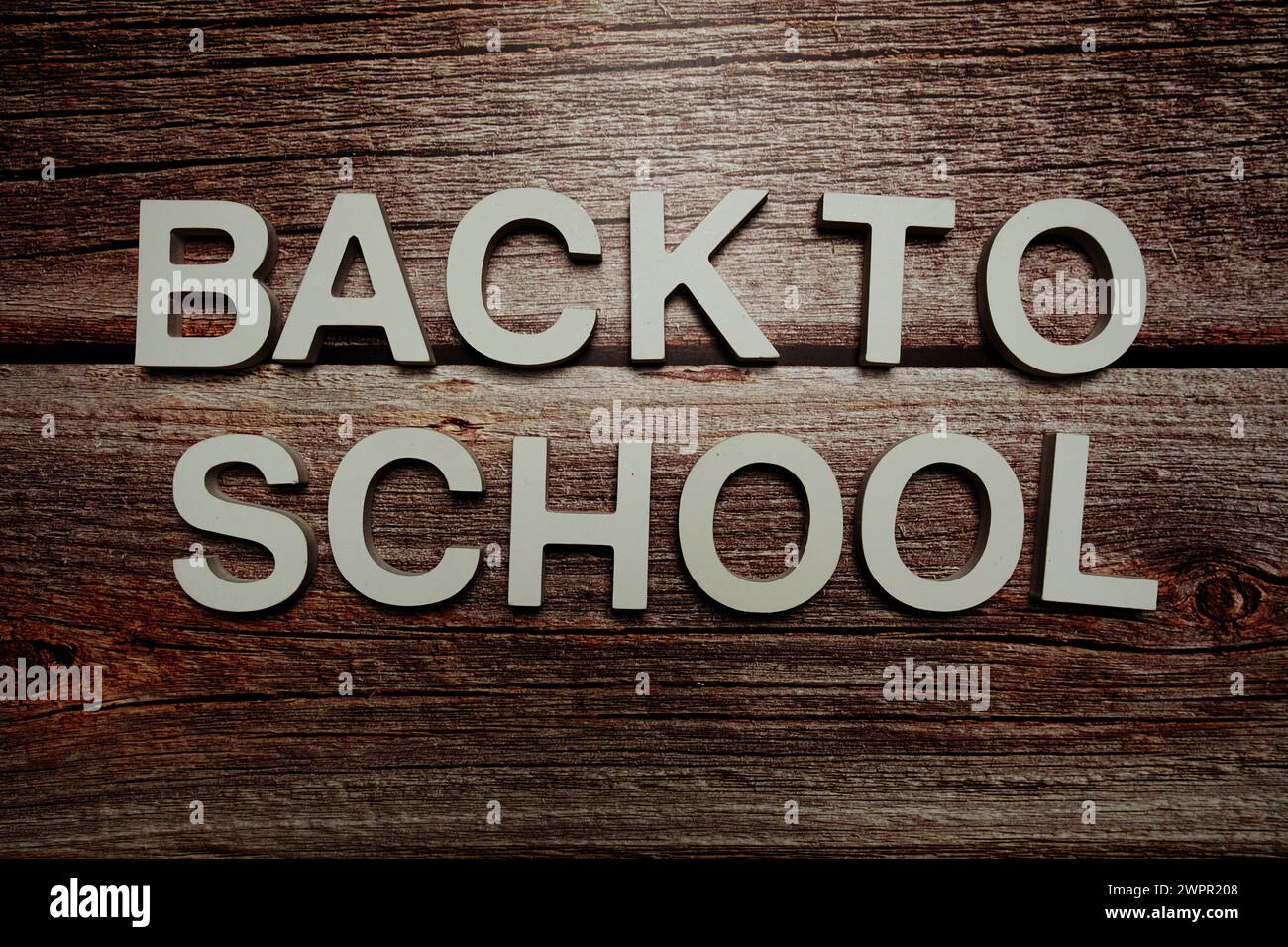 Back to School alphabet letters on wooden background Stock Photo - Alamy